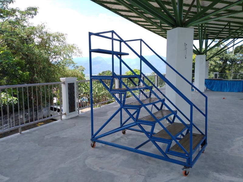 Blue Metal Pushable Ladder in a Building Project Stock Photo - Image of ...