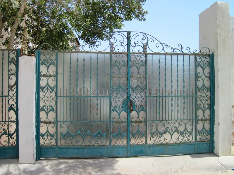 Blue metallic gate, Egypt stock image. Image of ornaments - 84804641