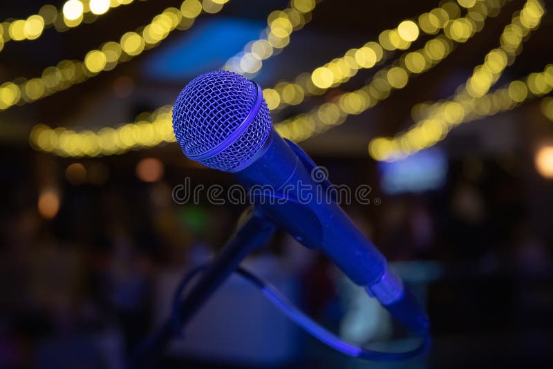 Blue Microphone Close-up Against the Backdrop of Scenery Lights on the ...