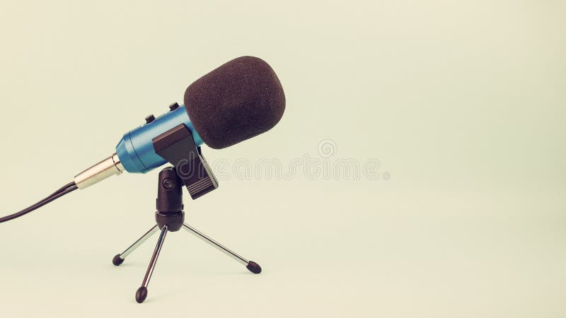 Blue Microphone with Wire on Stand in Vintage Style Stock Photo - Image ...