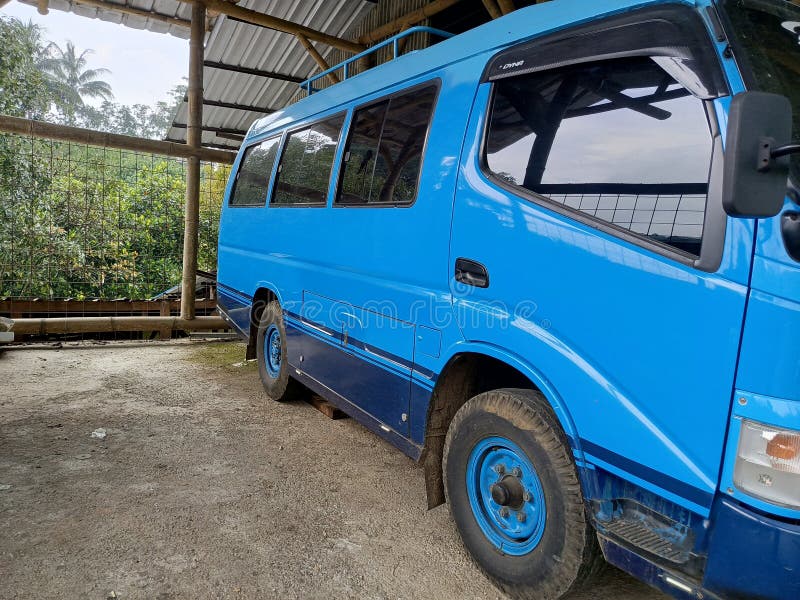 Blue Mini Bus Parked in the Garage Stock Image - Image of mini, garage ...