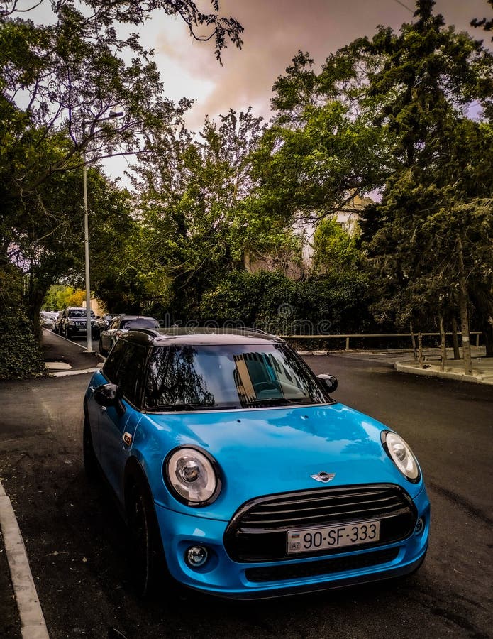 Blue mini cooper editorial stock image. Image of cars - 257626479