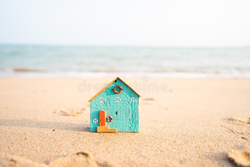 Blue Miniature Model House on the Beach and Blue Sky Background, House ...