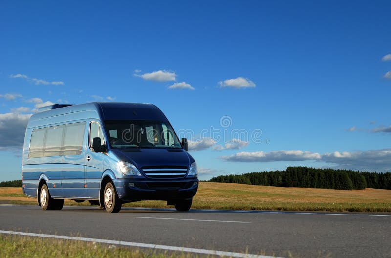 Blue minibus on highway stock image. Image of passenger - 10685853