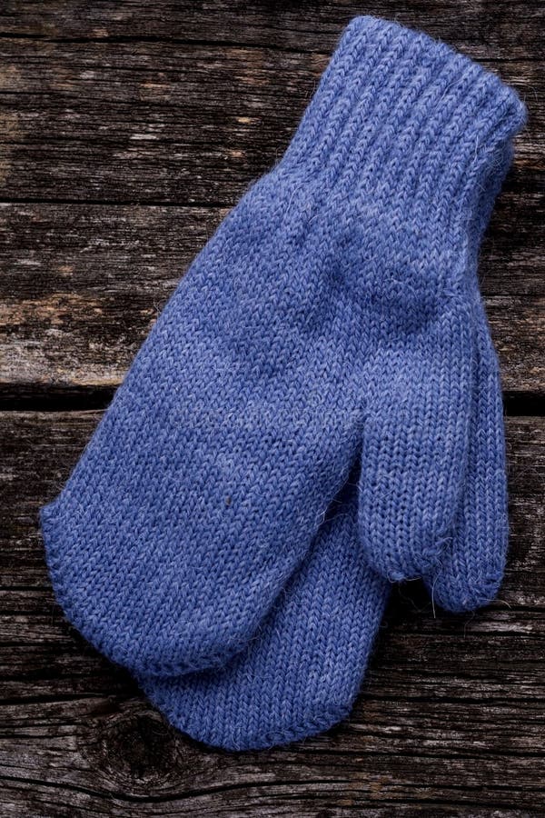 Blue mittens, isolated stock photo. Image of knitting - 100735688