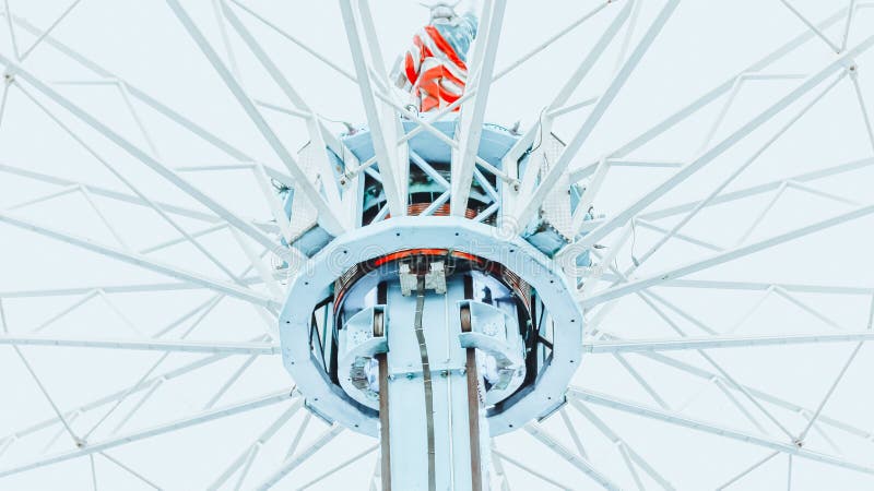 Blue Modern Amusement Park Carousel Tower Against Clear Sky from Below ...