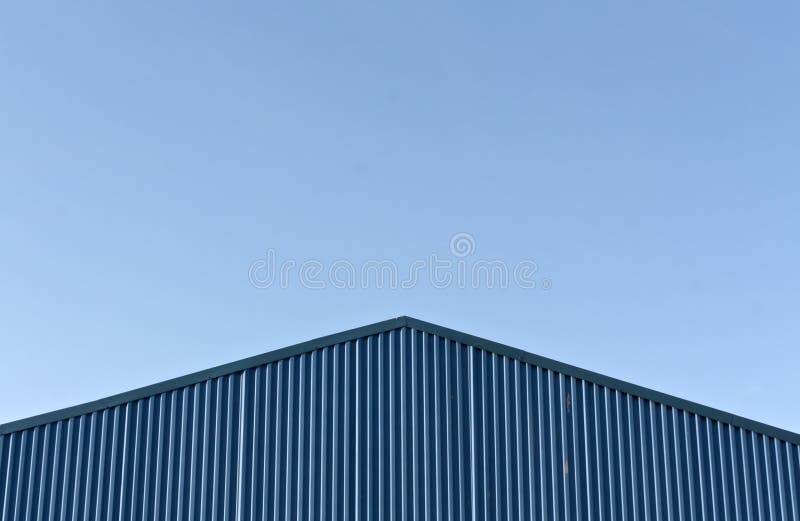 Blue Modern Warehouse Roof Against Blue Sky. Stock Image - Image of ...