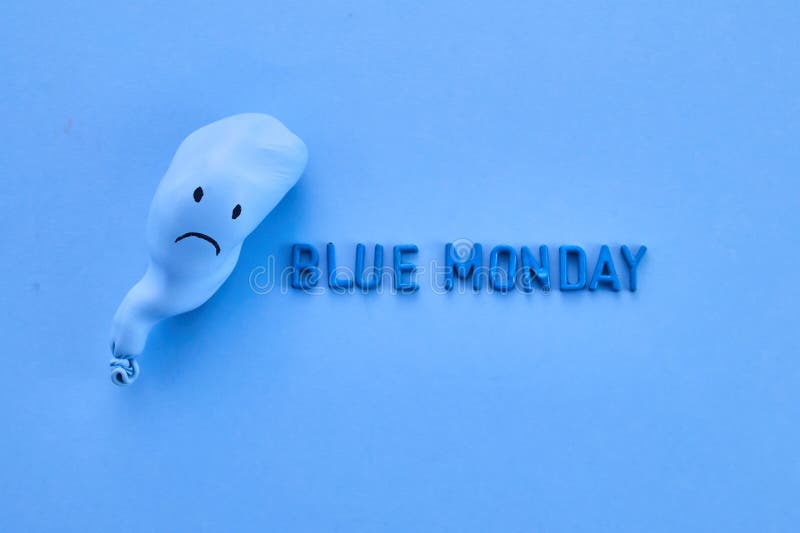 Blue Monday Mood. a Deflated Balloon with a Sad Face Stock Photo ...