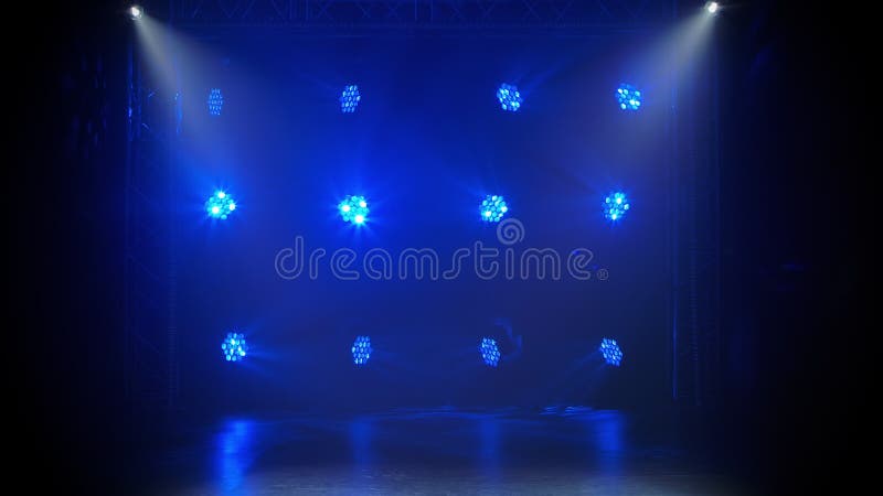 Dynamic Stage Lights Flicker through Smoke, Perfect for Concert Visuals ...