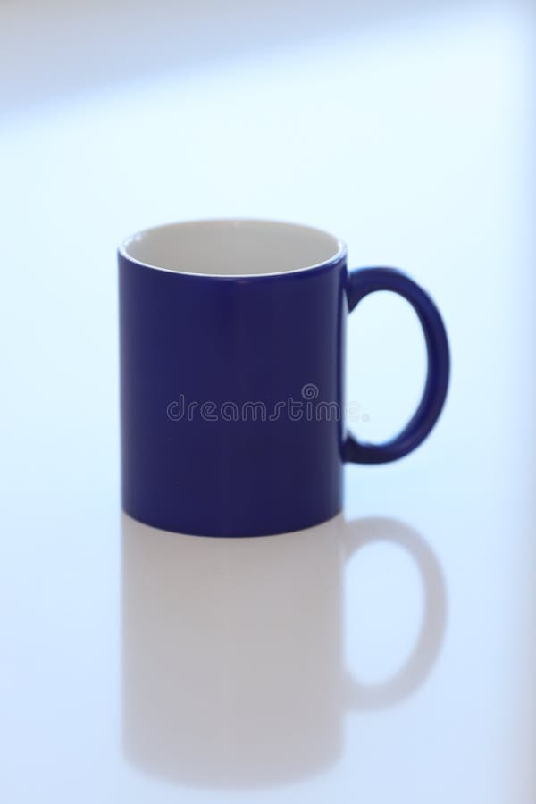 Blue mug with a reflection stock photo. Image of cafe - 212888900