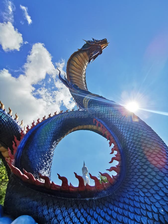 Blue Naga Fighting with the Sun Stock Photo - Image of poster, landmark ...