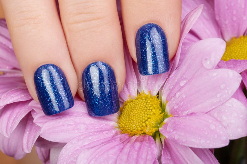 Blue nail polish. stock image. Image of hygiene, flower - 59349341
