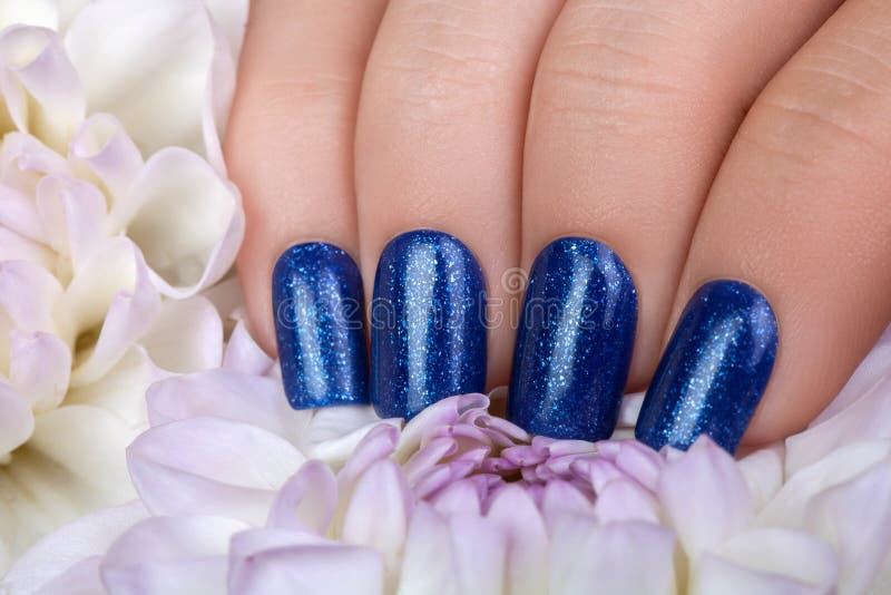 Blue nail polish. stock photo. Image of girl, makeup - 59349476