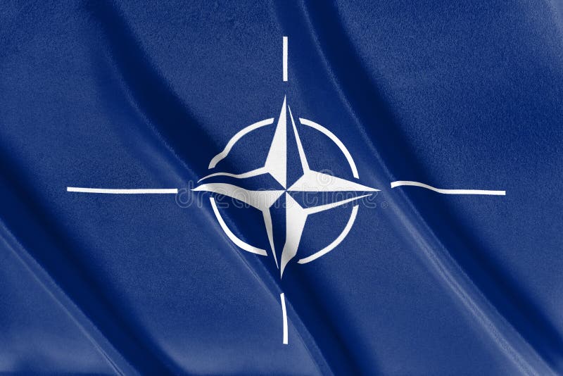 The Blue Nato Logo on a Side of a Large Gray Modern Warship with Radars ...