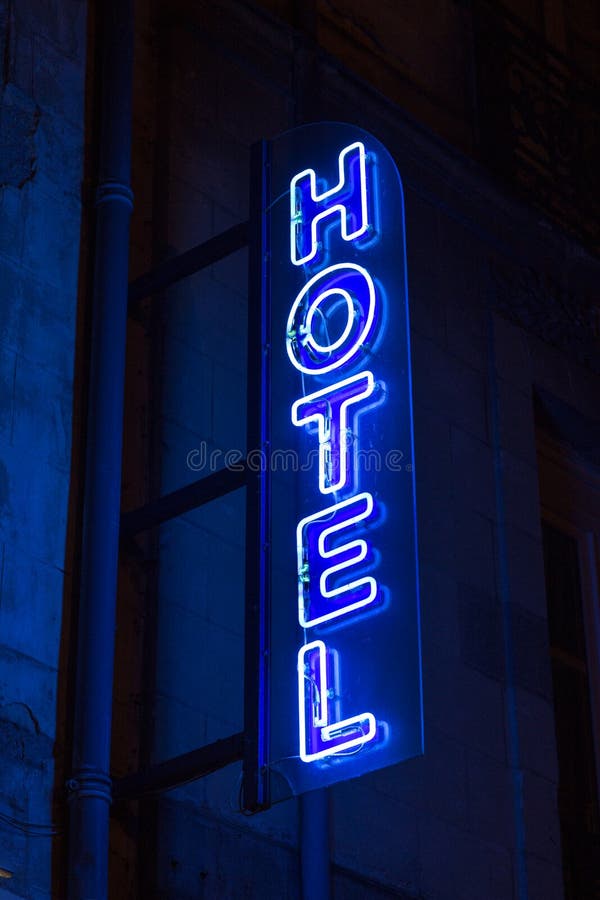 Blue Neon Hotel Sign in the Night Stock Photo - Image of exterior ...