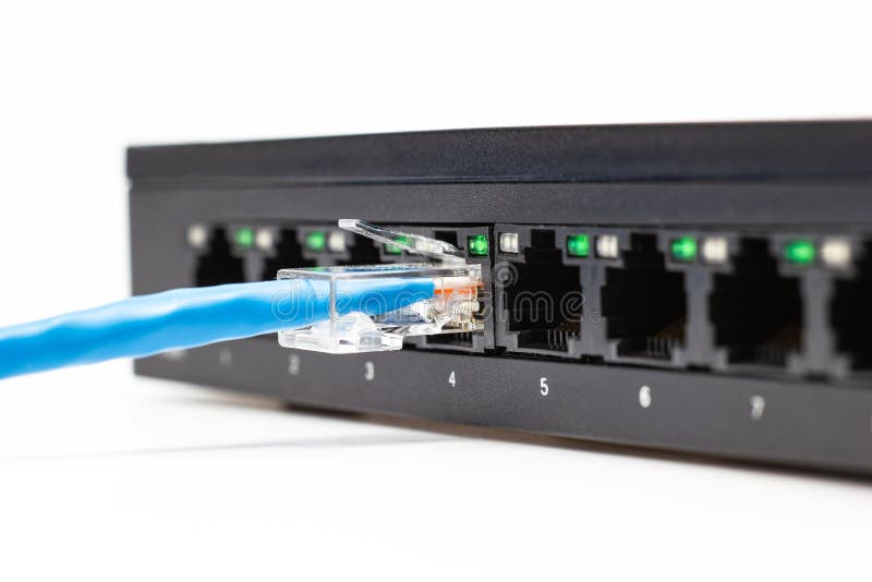 The Blue Network Cables Connect Port Switch on White Table Stock Photo ...
