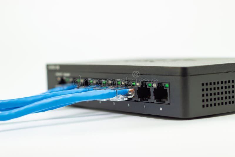 The Blue Network Cables Connect Port Switch on White Table Concept ...