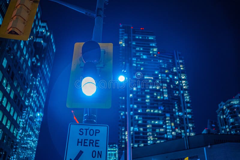 Blue night traffic light stock photo. Image of light - 349240244