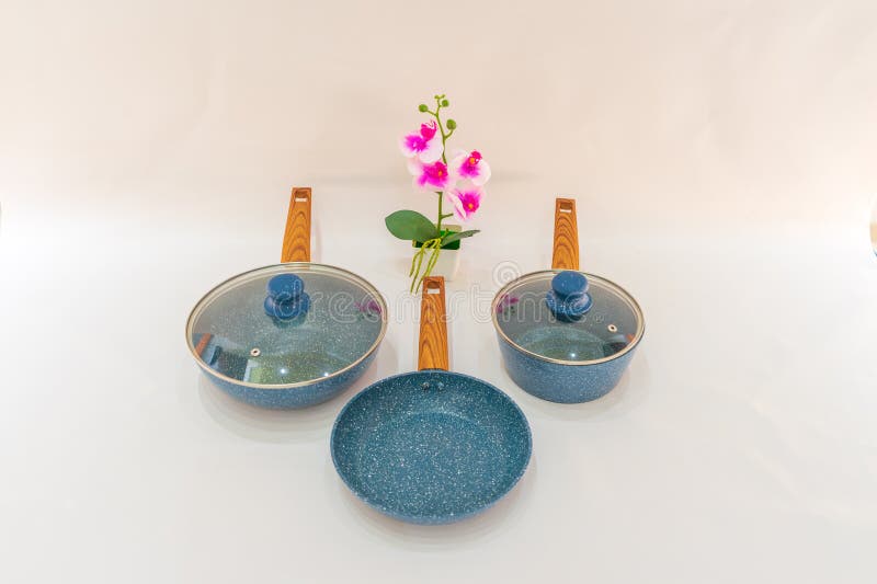 Blue Non-Stick Pot and Teflon Pan with Wooden Handle Stock Photo ...