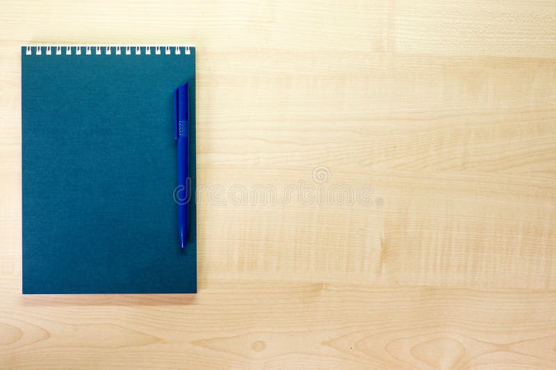 Blue Notebook and Blue Pen on the Desk Stock Photo - Image of ballpoint ...