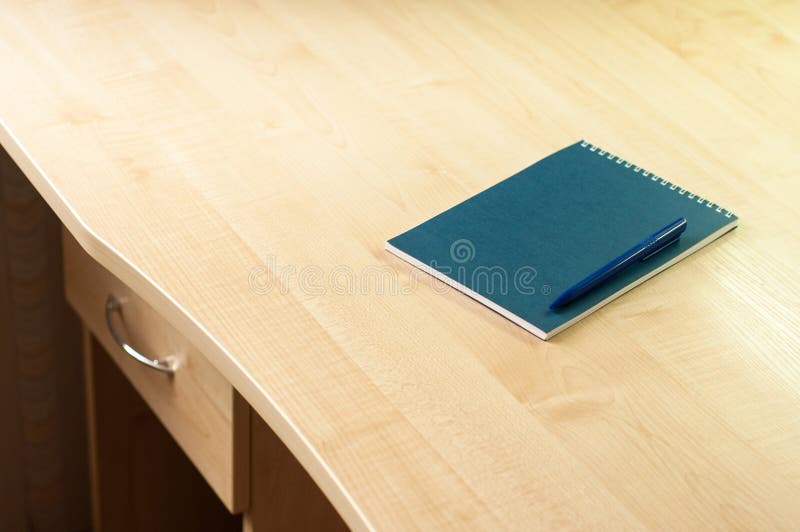 Blue Notebook and Blue Pen on the Desk Stock Photo - Image of ...