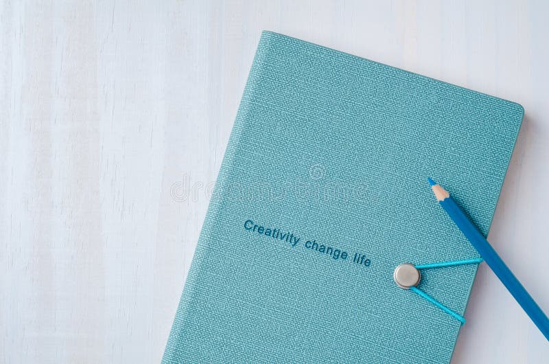 Blue Notebook with Color Pencil on White Wooden Background Stock Photo ...