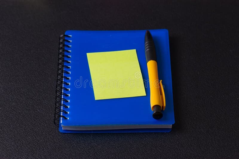 Blue Notepad with Multi-colored Stickers and Pen Stock Photo - Image of ...