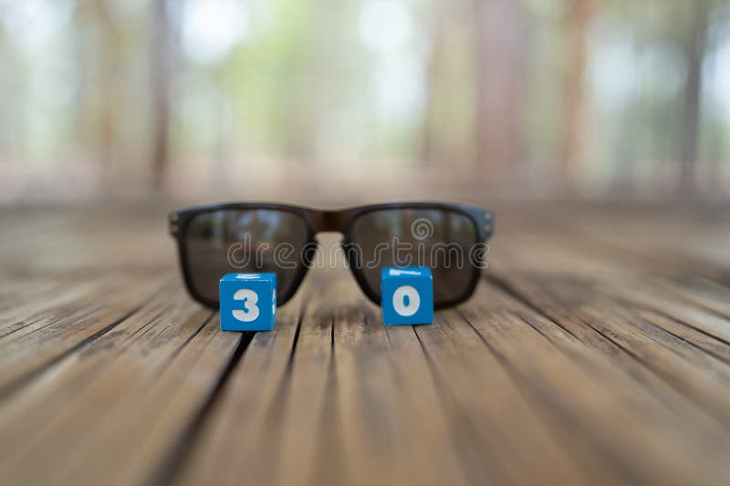 Blue Number Box Showing the Numbers Three and Zero Was Placed in Front ...