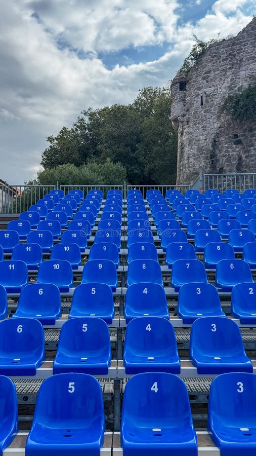 Blue Numbered Seats in an Outdoor Venue Stock Photo - Image of concert ...