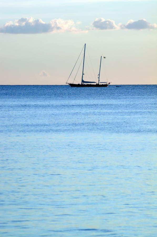 Blue ocean and boat stock image. Image of cloudy, boating - 1360399