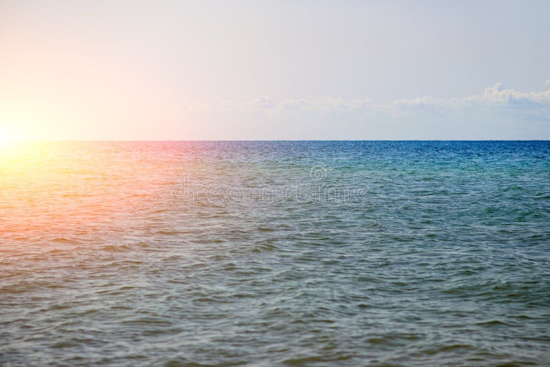 The Blue Ocean with Dull Clouds on a Lovely Sunny Day Stock Photo ...