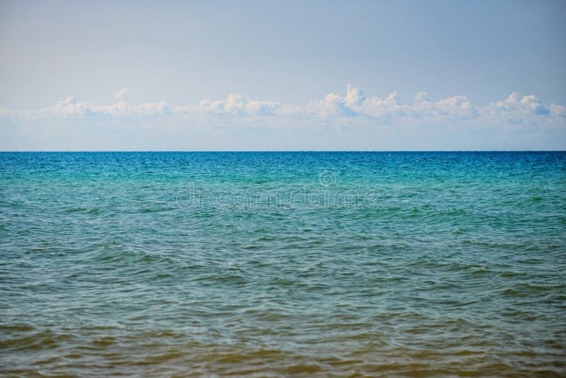 The Blue Ocean with Dull Clouds on a Lovely Sunny Day Stock Image ...