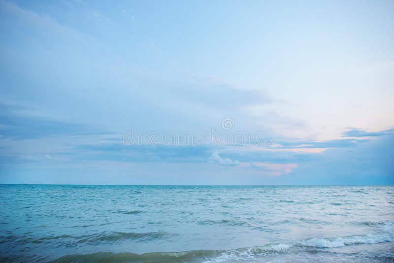 The Blue Ocean with Dull Clouds on a Lovely Sunny Day Stock Image ...