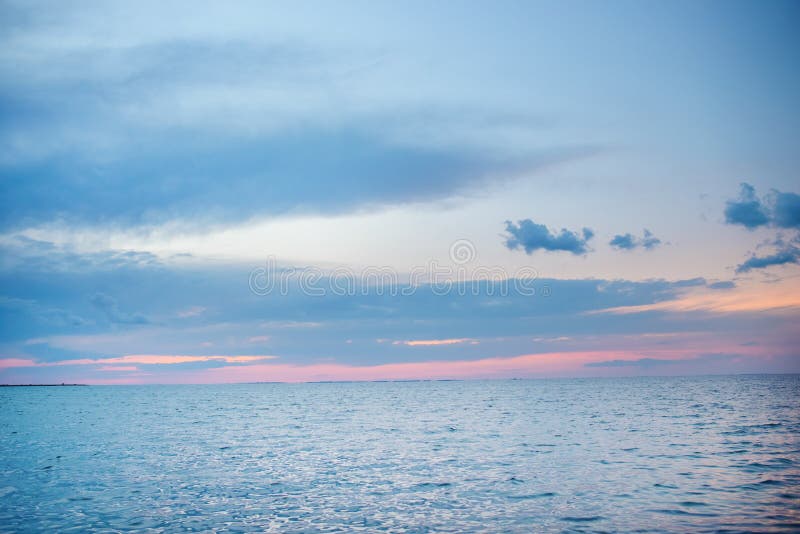 The Blue Ocean with Dull Clouds on a Lovely Sunny Day Stock Photo ...