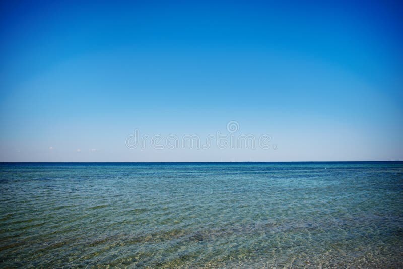 The Blue Ocean with Dull Clouds on a Lovely Sunny Day Stock Image ...