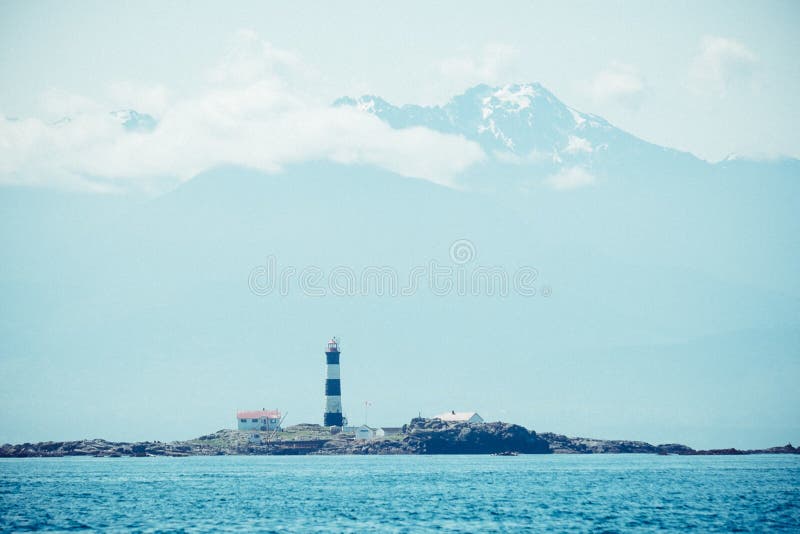 Blue Ocean Near in Black and White Lighthouse during Daytime Stock ...