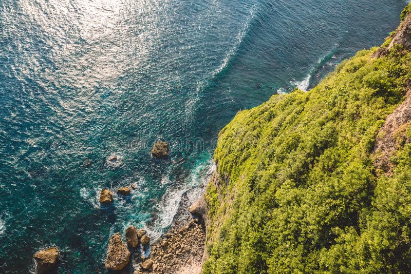 Blue Ocean with Rocks and Cliff in Uluwatu, Bali Stock Photo - Image of ...