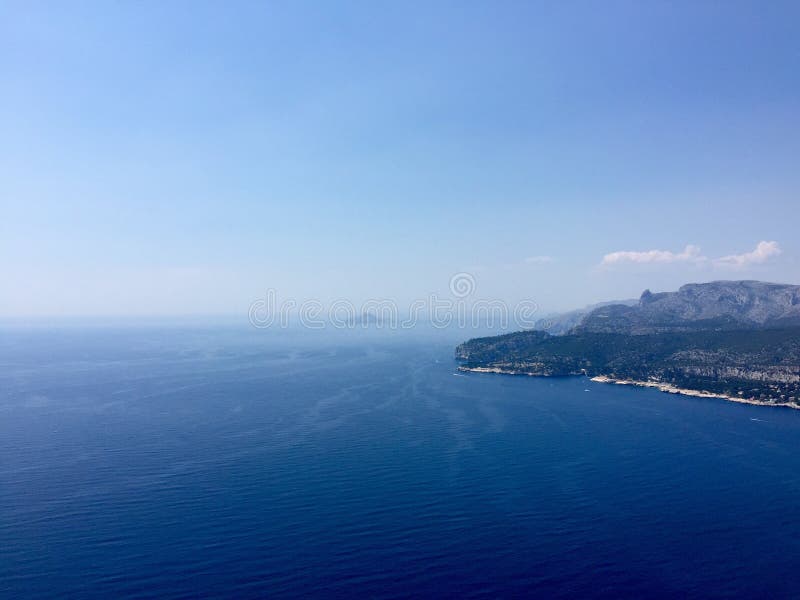 Blue ocean and shore stock image. Image of cooyspace - 68598711