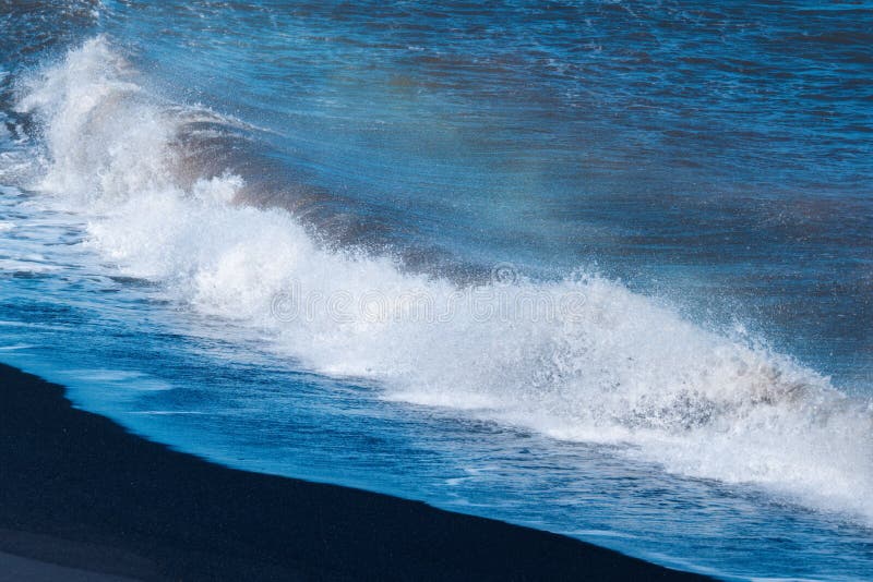 Blue Ocean Wave with Splashing Hitting on Black Sand Beach in Summer ...