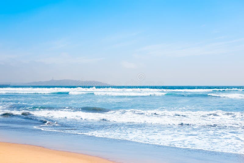 Blue Ocean Waves and Yellow Sand Stock Photo - Image of chile, shore ...