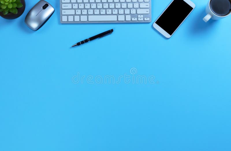Blue Office Desk with Computer, Dark Coffee and Other Supplies for Work ...