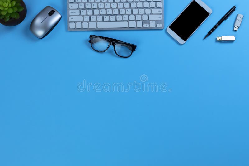 Blue Office Desk with Computer and Other Supplies Stock Image - Image ...