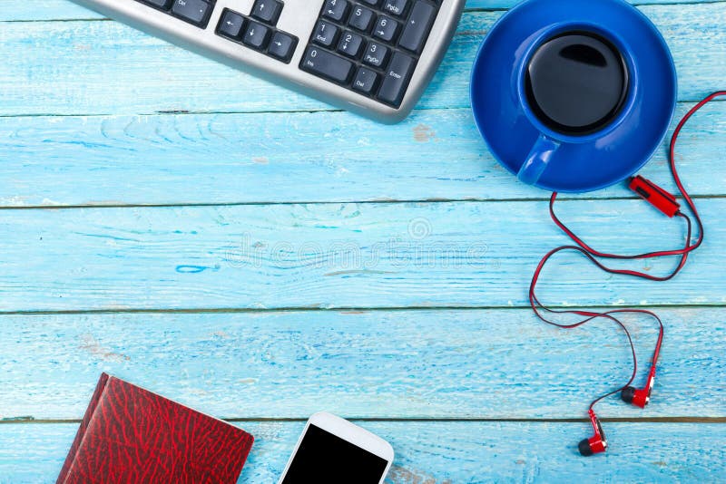 Blue Office Desk Table with Computer, Pen and a Cup of Coffee, Lot of ...