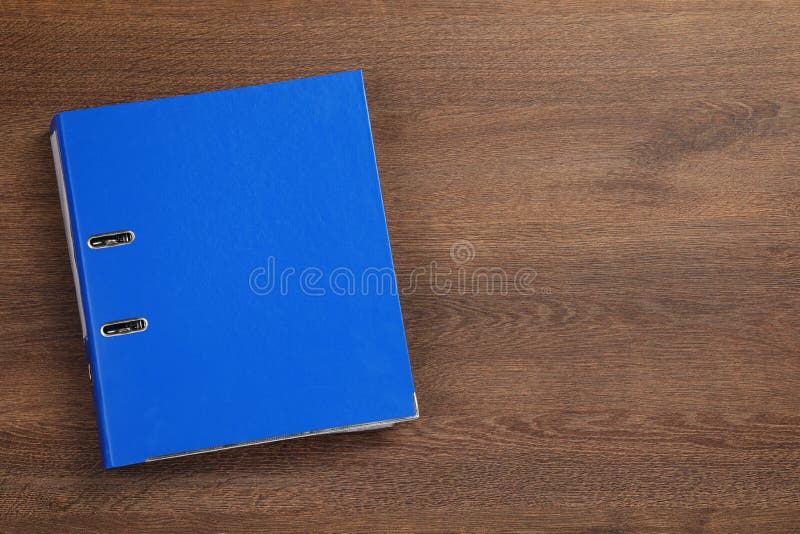 Blue Office Folder on Wooden Table, Top View. Space for Text Stock ...
