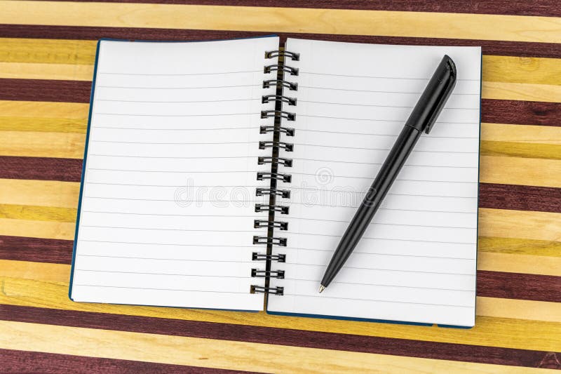 Blue Open Lined Notebook with a Black Black Pen Isolated on White Stock ...