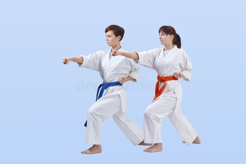 With Blue and Orange Belt Athletes Train Punch Arm Stock Photo - Image ...
