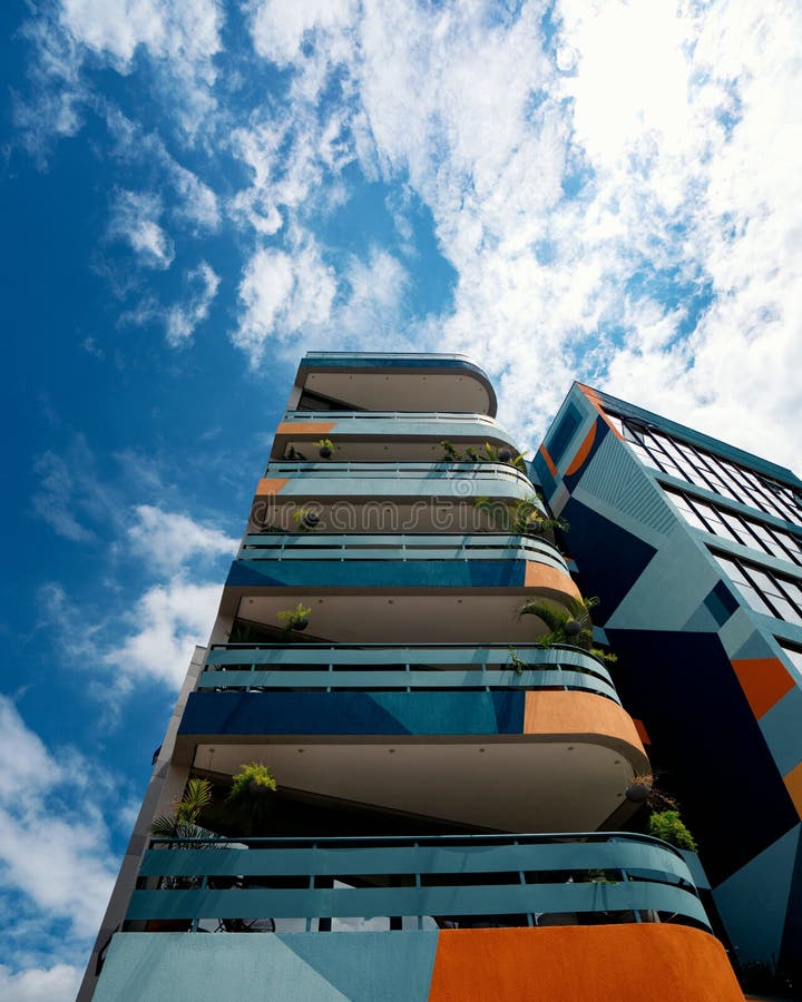 Blue and Orange Building with Beautiful and Sunny Blue Sky in the ...