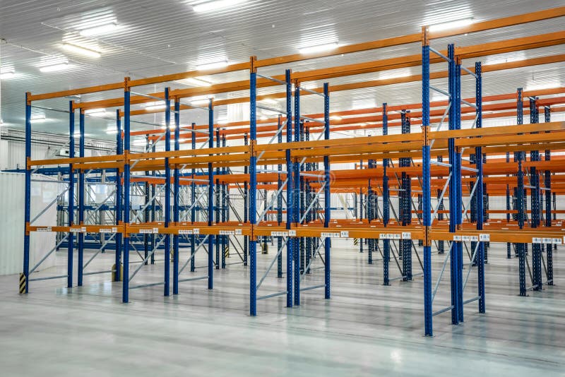 Empty Warehouse Shelves in Grey Industrial Interior Stock Photo - Image ...