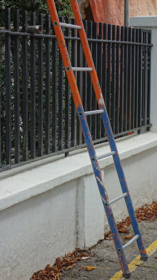 Blue and Orange Ladder stock image. Image of building - 46426895