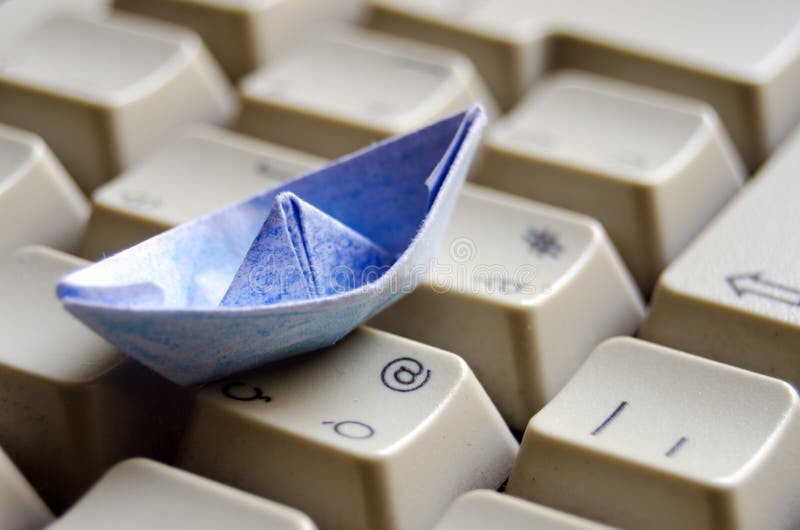 Blue Origami Boat on Keyboard Stock Photo - Image of origami ...